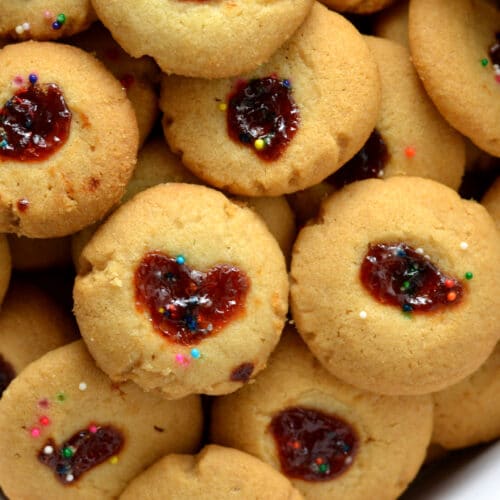 Mantecaditos (Puerto Rican Guava Thumbprint Cookies) - Delish D'Lites