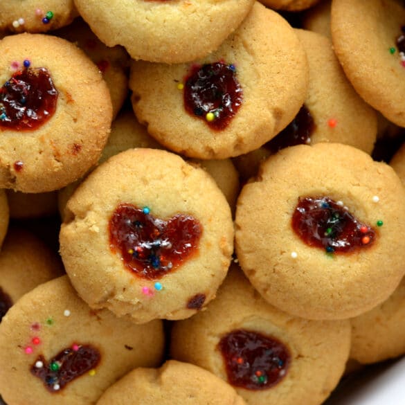 Mantecaditos (Puerto Rican Guava Thumbprint Cookies) - Delish D'Lites