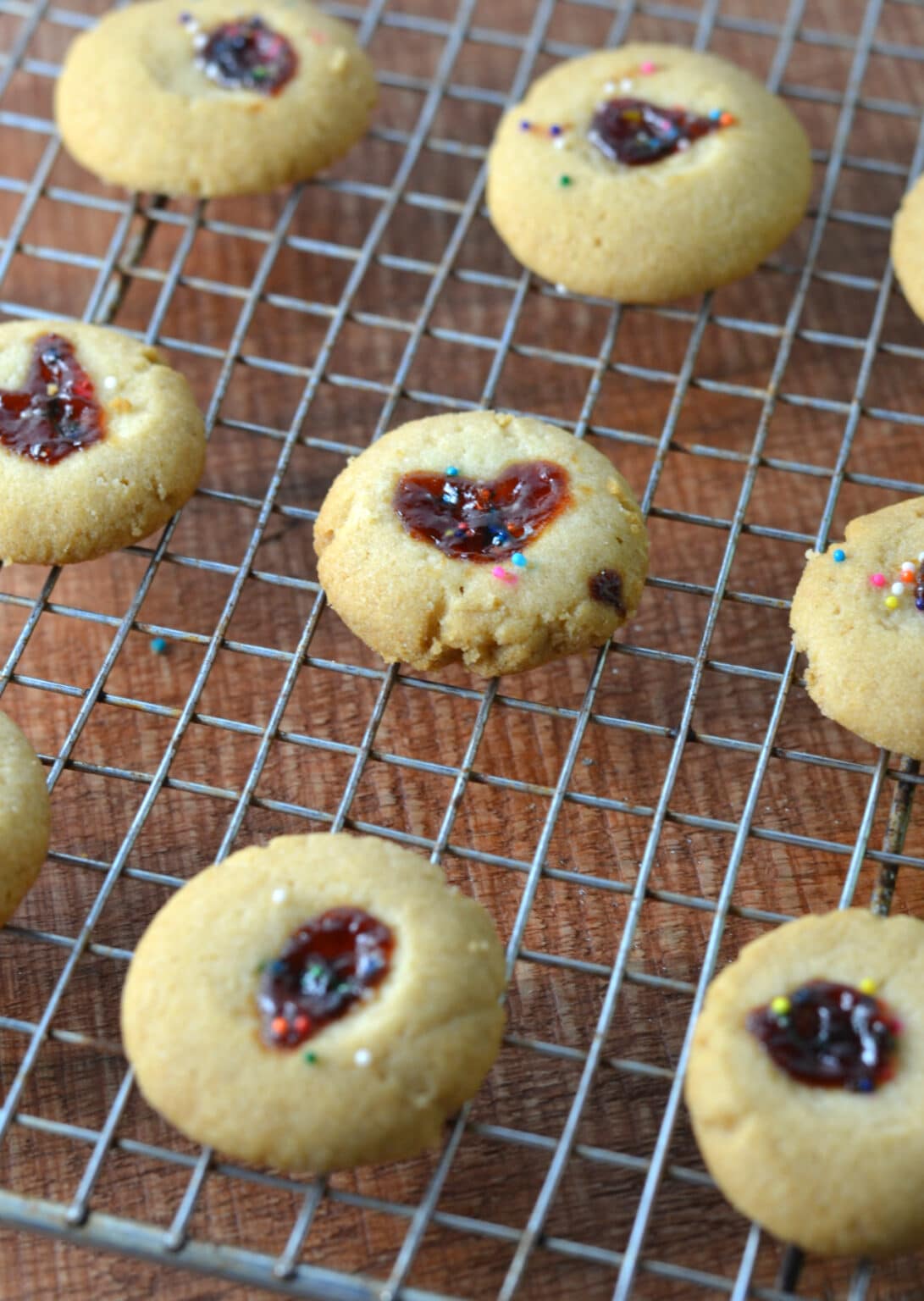 Mantecaditos (Puerto Rican Guava Thumbprint Cookies) - Delish D'Lites