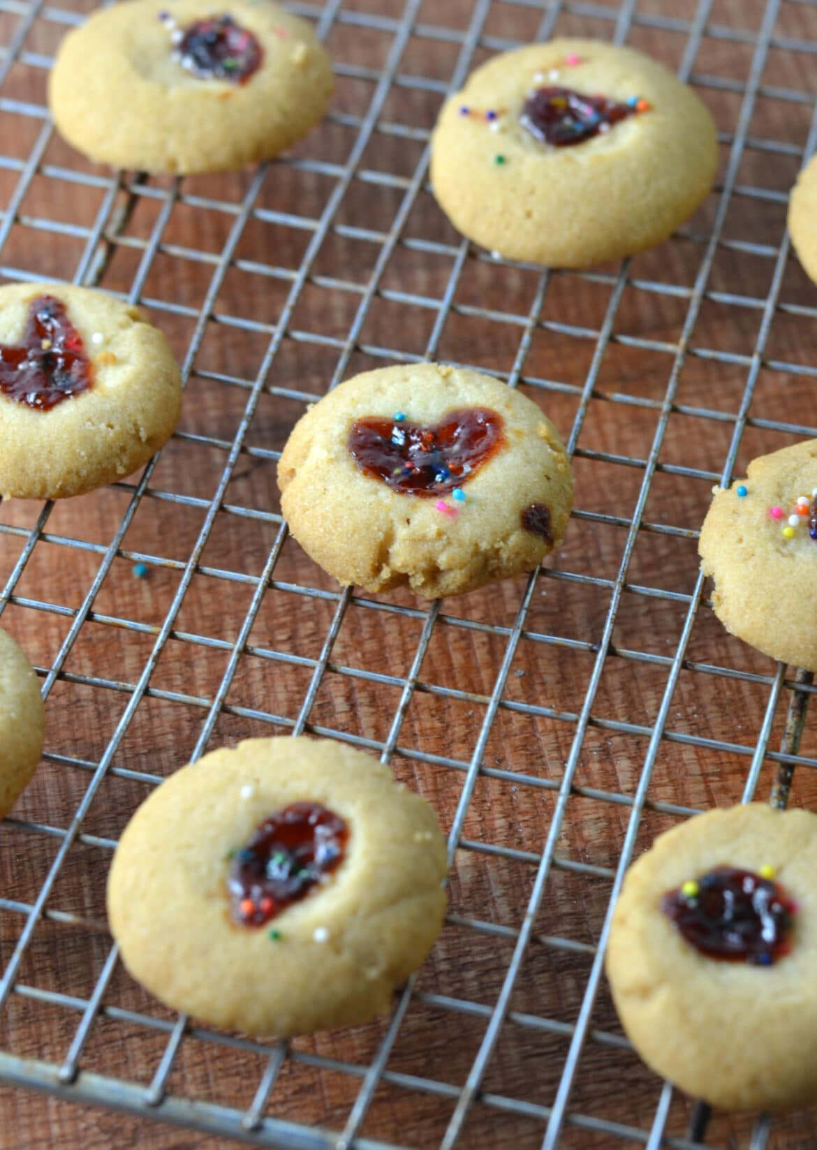 Mantecaditos (Puerto Rican Guava Thumbprint Cookies) - Delish D'Lites